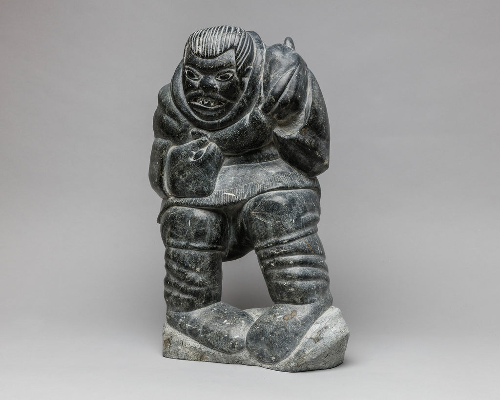 Giant Carrying a Seal, c. 1970, Inuit Carving – Quintana Galleries